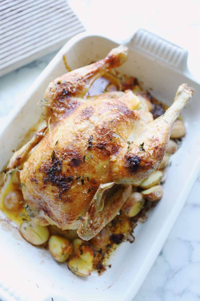 Hel kylling - Opskrift på saftig helstegt kylling i ovn med citronsmør